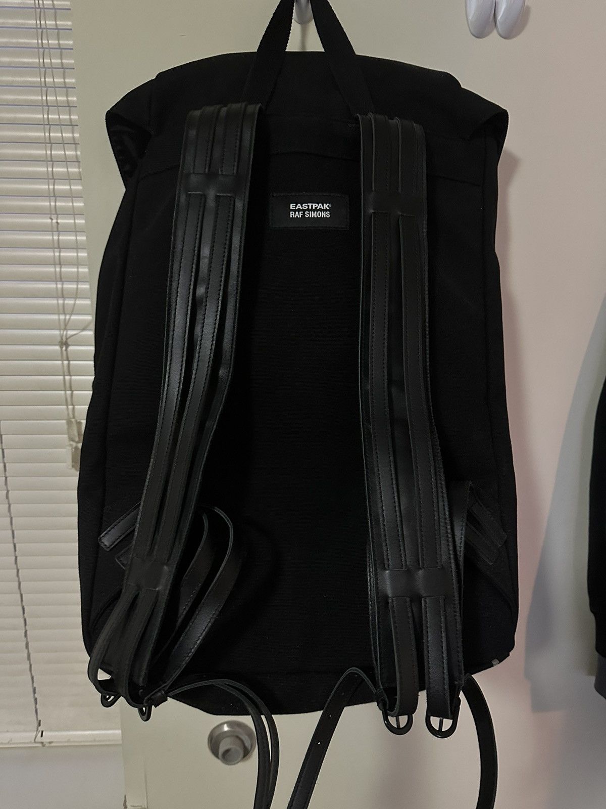 Eastpak × Raf Simons RAF SIMONS Black Eastpak Edition Topload L Loop ...