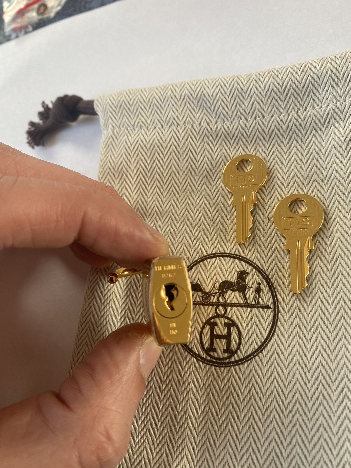 Hermes Authentic Gold plated Hermès padlock with two keys | Grailed