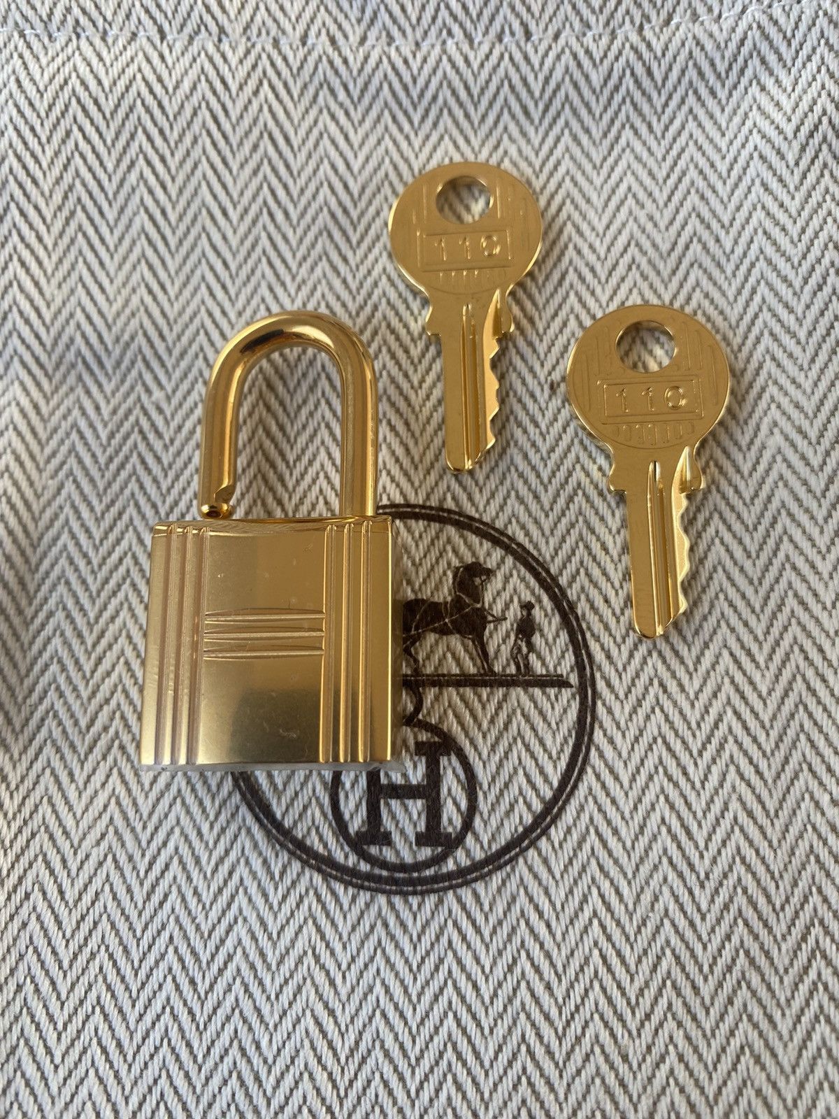 Hermes Authentic Gold plated Hermès padlock with two keys | Grailed