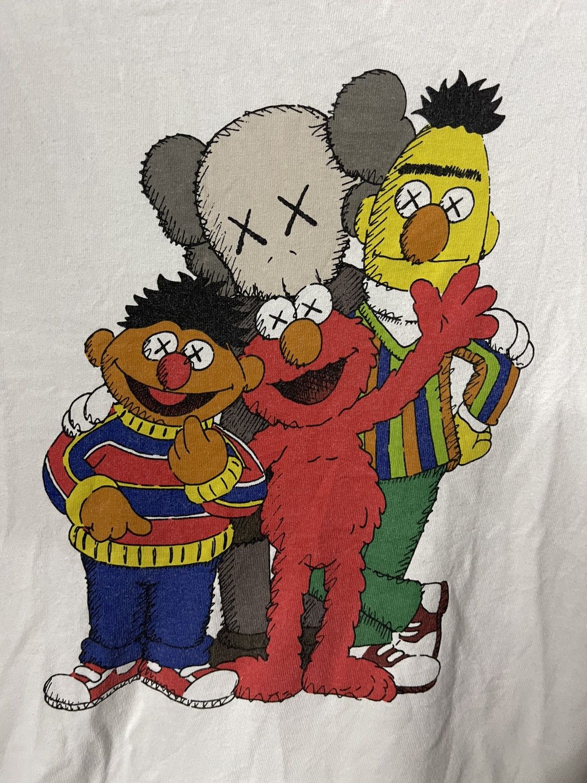 Kaws × Uniqlo UNIQLO x KAWS x SESAME STREET CHARACTERS ELMO | Grailed