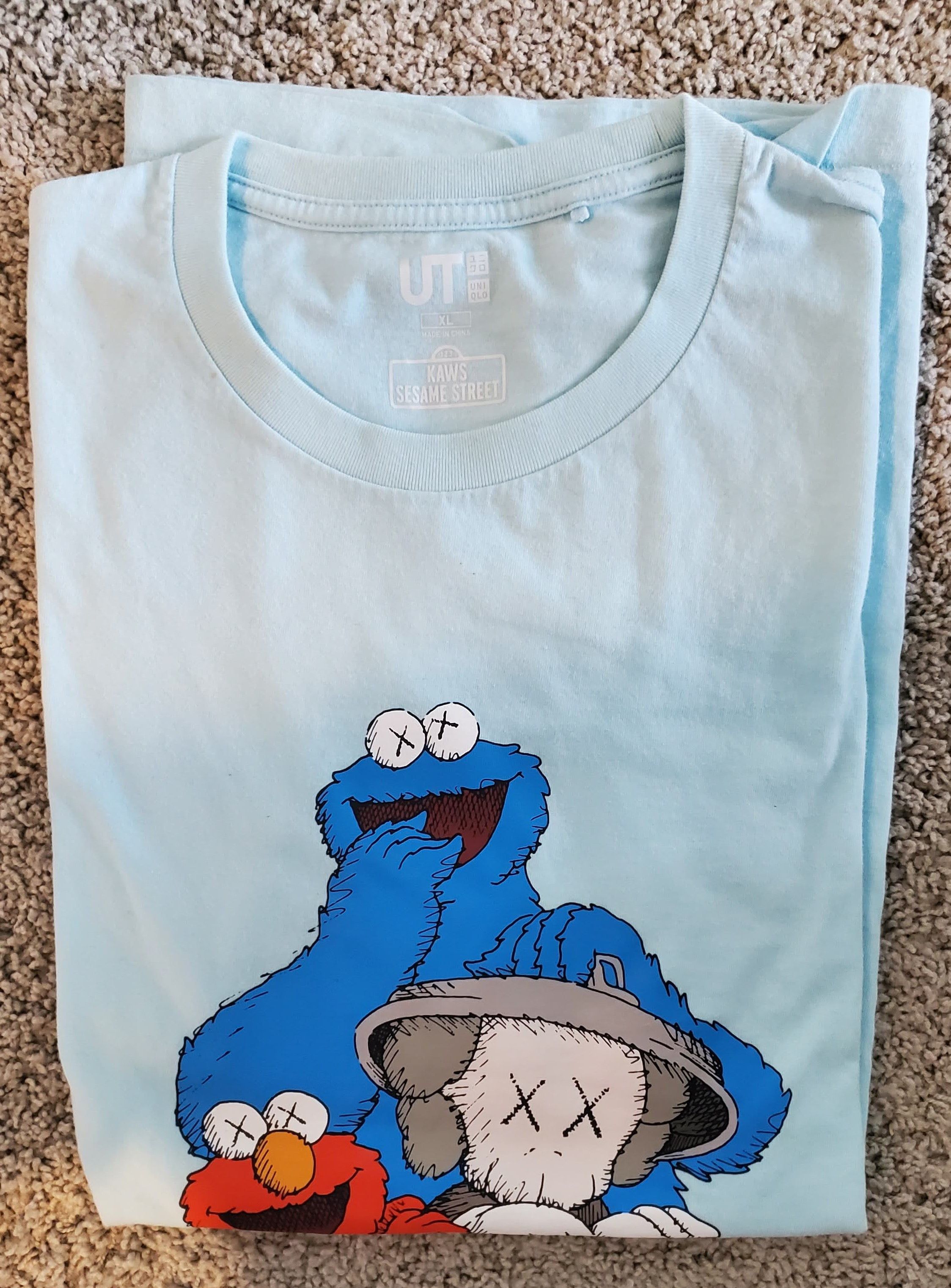 Kaws × Uniqlo Kaws X Uniqlo X Sesame Street (XL) | Grailed