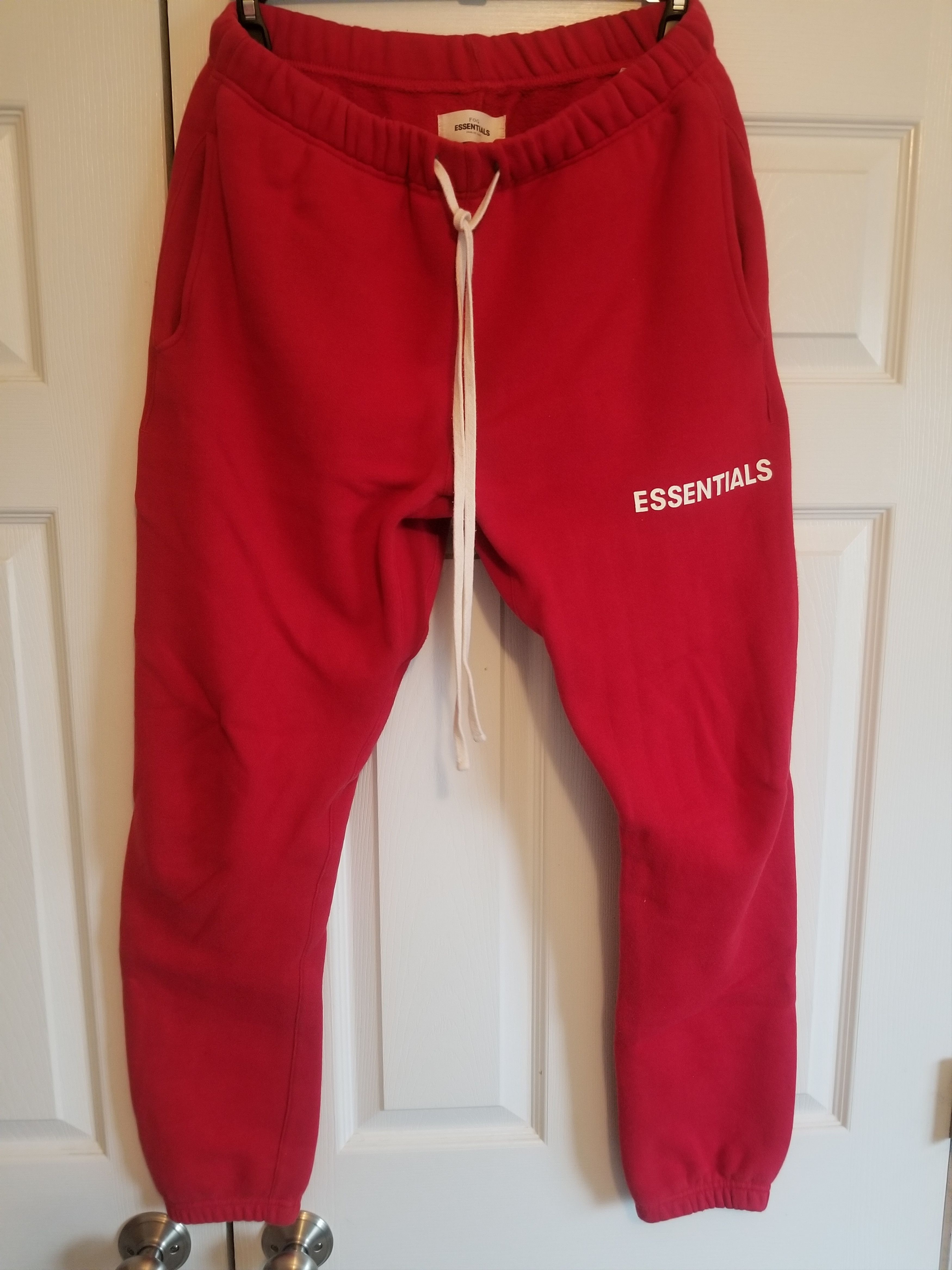 Fear of God Fear of God Essentials Red Graphic Print Sweatpants | Grailed