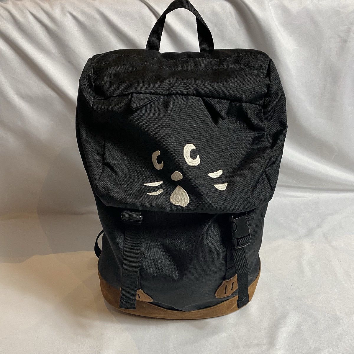 Issey Miyake Ne-Net nya cat face barlow backpack 🐈‍⬛ | Grailed