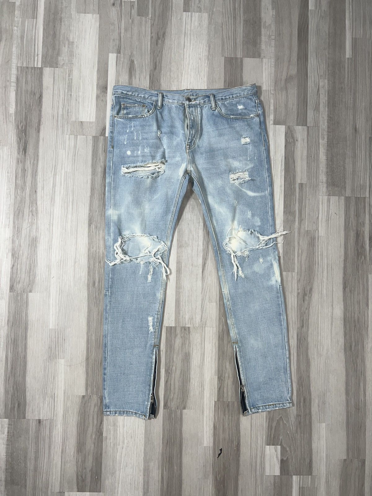 MNML RIPPED LIGHT WASH DENIM JEANS | Grailed