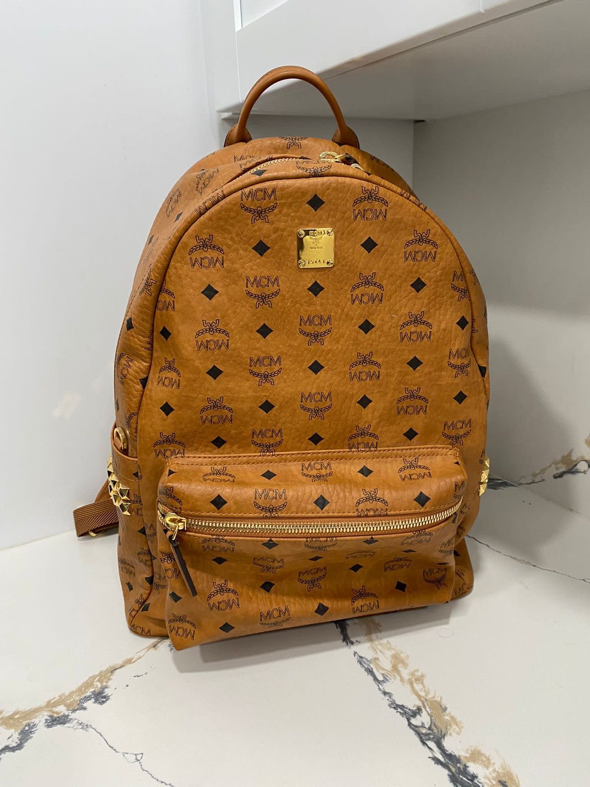 MCM Stark Side Studs Backpack in Visetos | Grailed