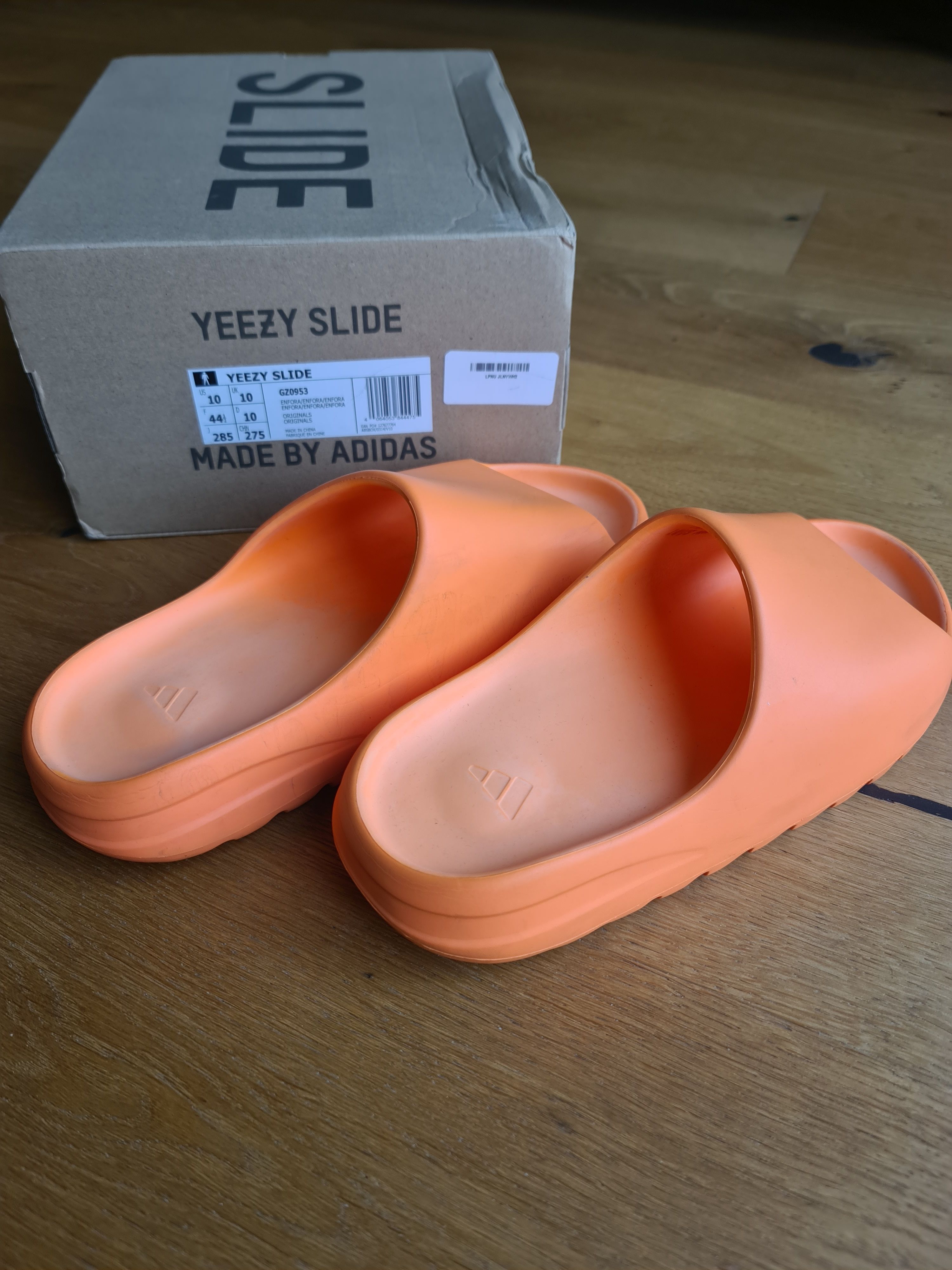 Adidas Yeesy slides enflame orange yeezy slides | Grailed