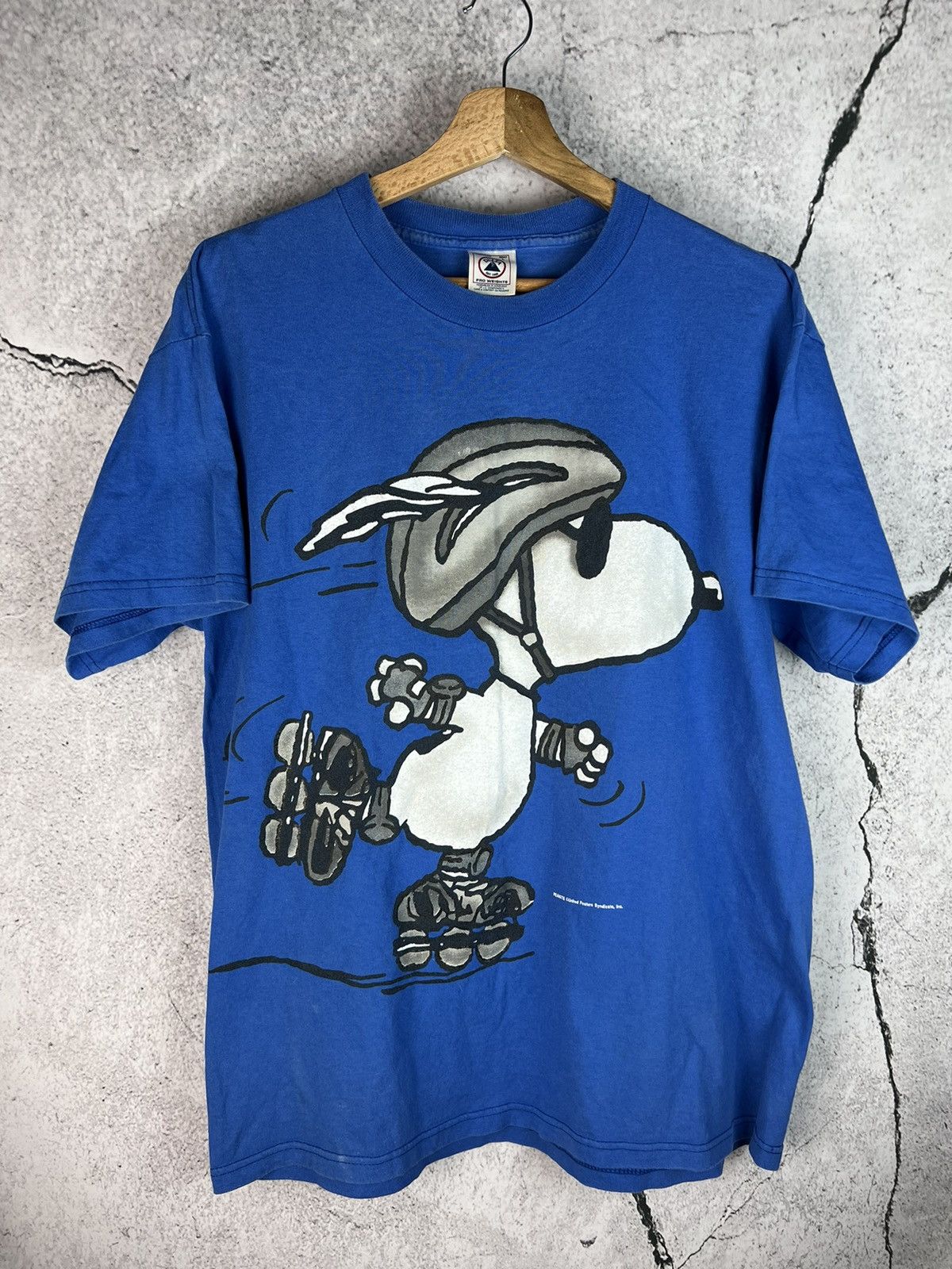 Movie × Peanuts × Vintage Vintage 90s 80s Snoopy Peanuts rollers tshirt | Grailed