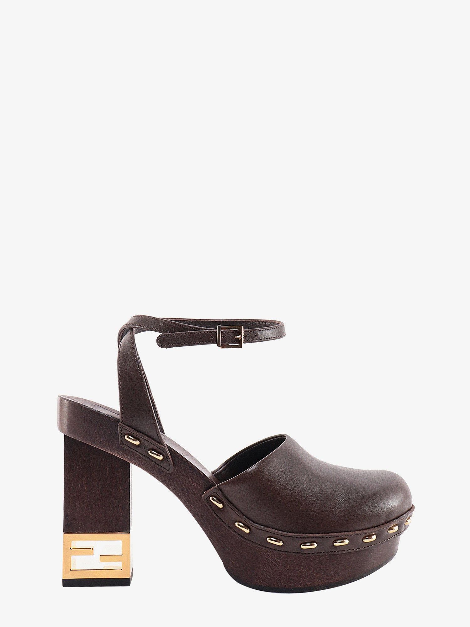 Fendi WOMAN Leather clogs with metal details | Grailed