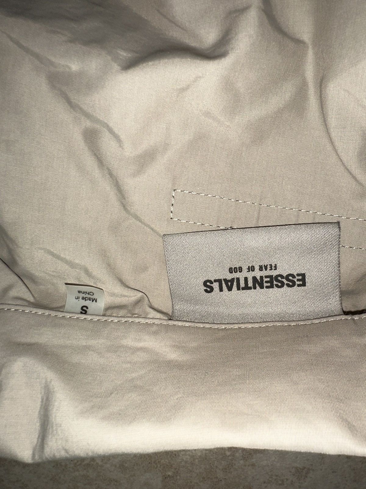 Essentials Essential rain jacket | Grailed