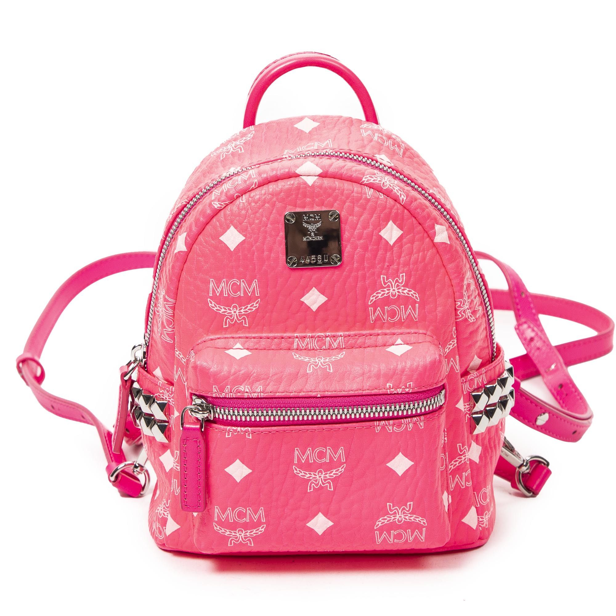 MCM Mini Side Stud Stark Bebe Boo Backpack in Neon Pink Visetos Coated ...