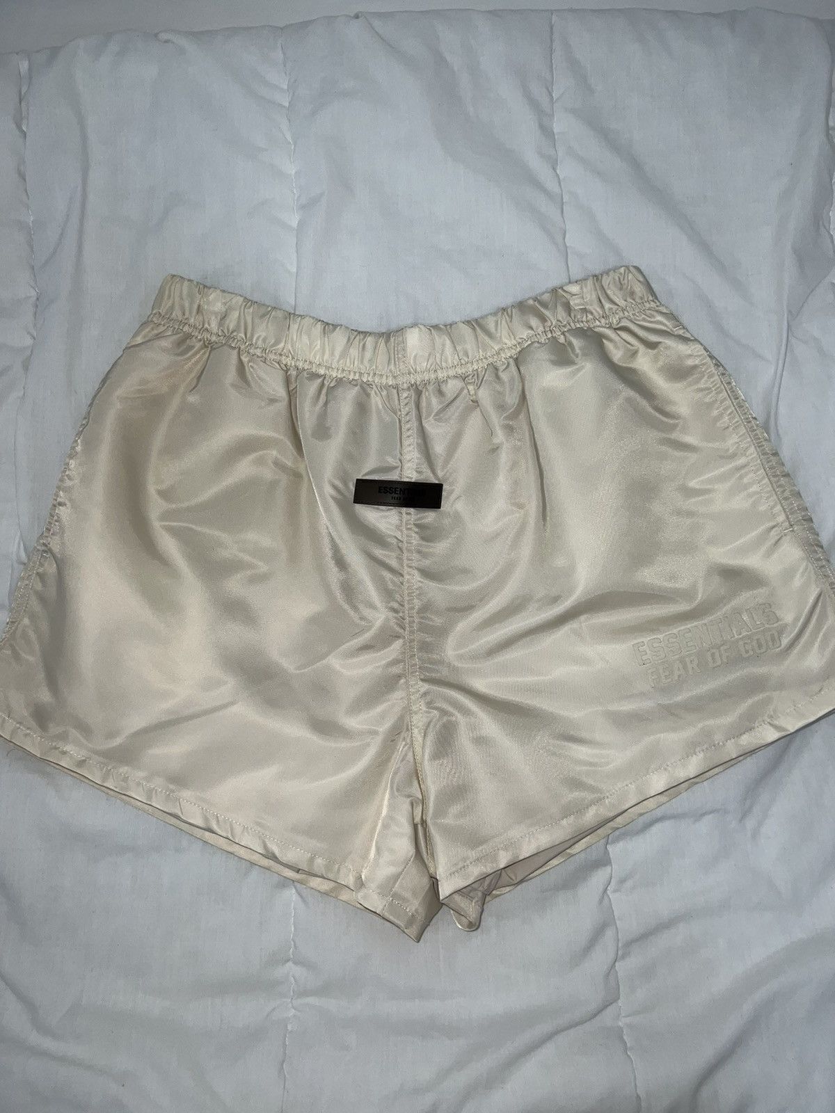 Essentials Fear Of God Essentials Nylon Running Shorts (Egg Shell ...