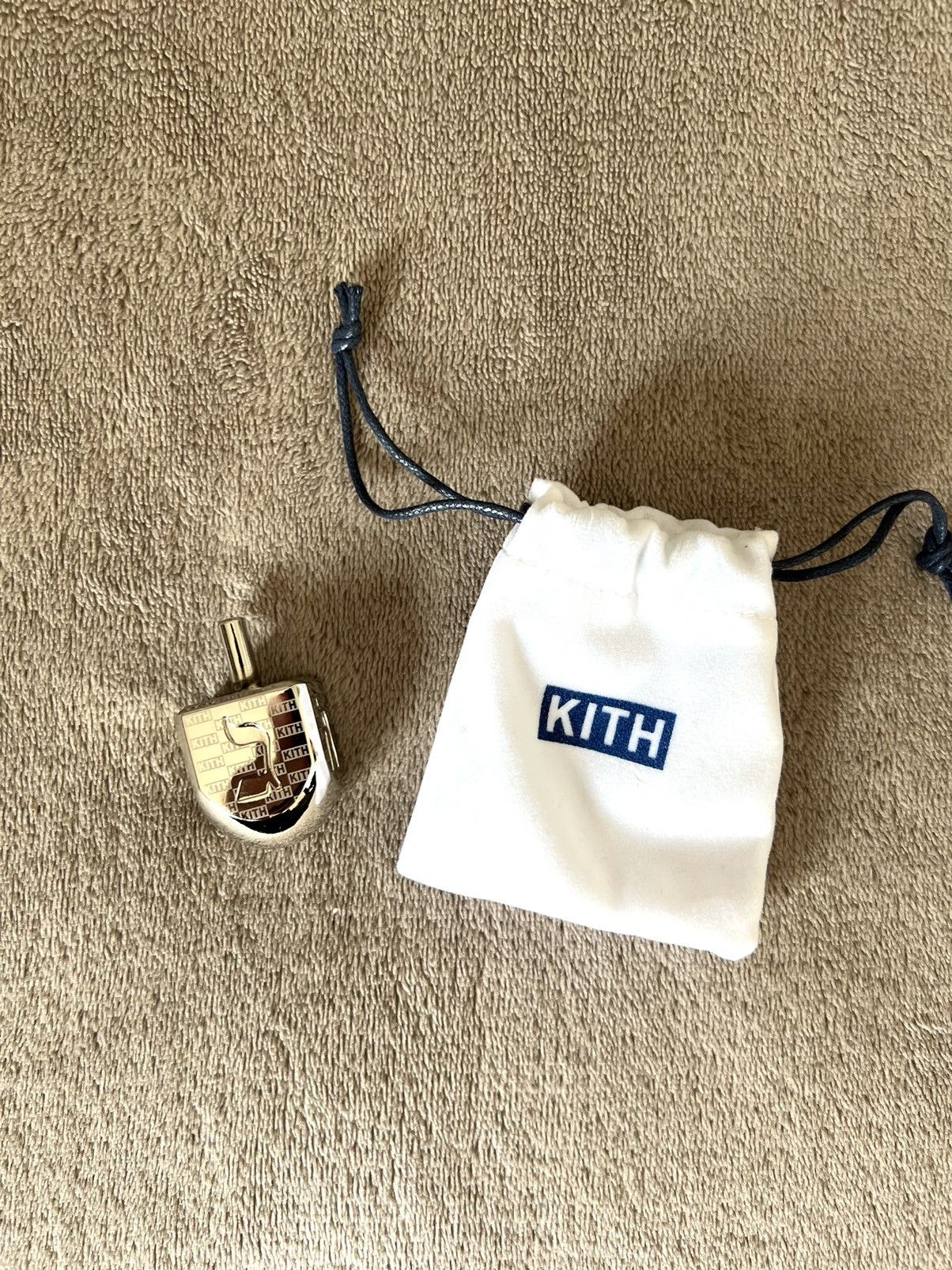 Kith RARE FIRST-EDITION Kith Hanukkah Dreidel Silver 2021 | Grailed