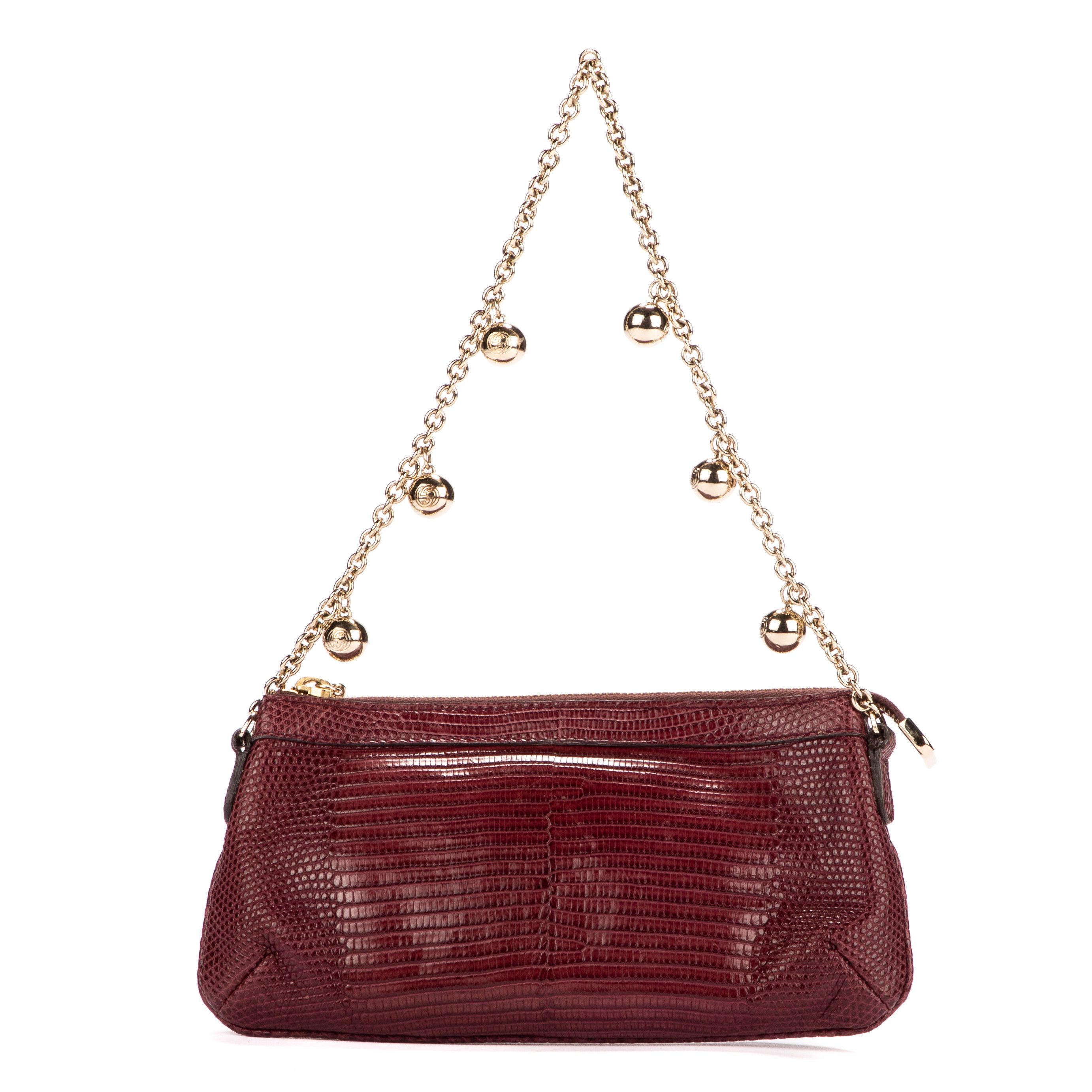 Gucci Balls accessories clutch in Burgundy Lizard Leather | Grailed