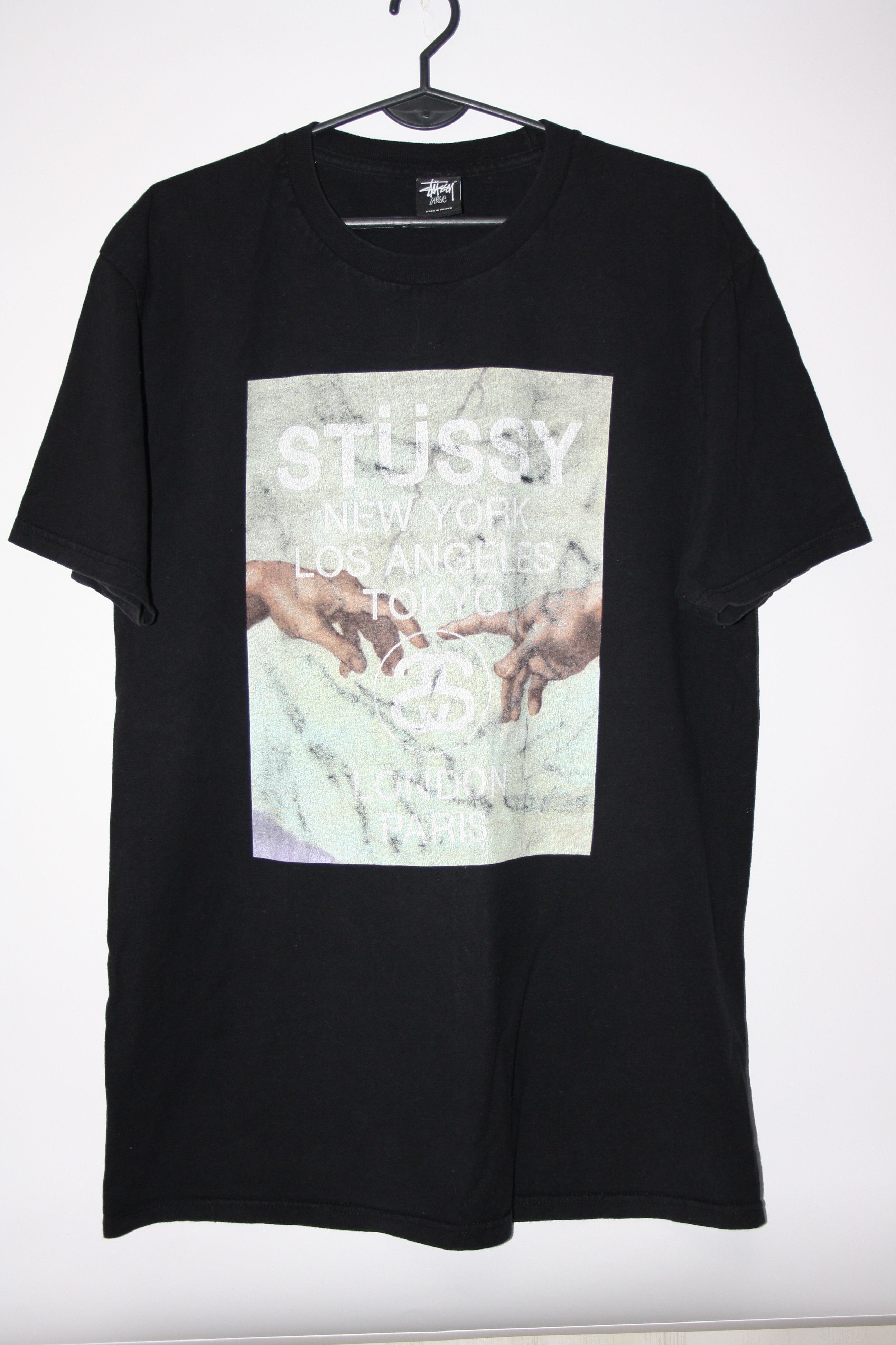 Streetwear × Stussy Stussy hand of god black tee | Grailed