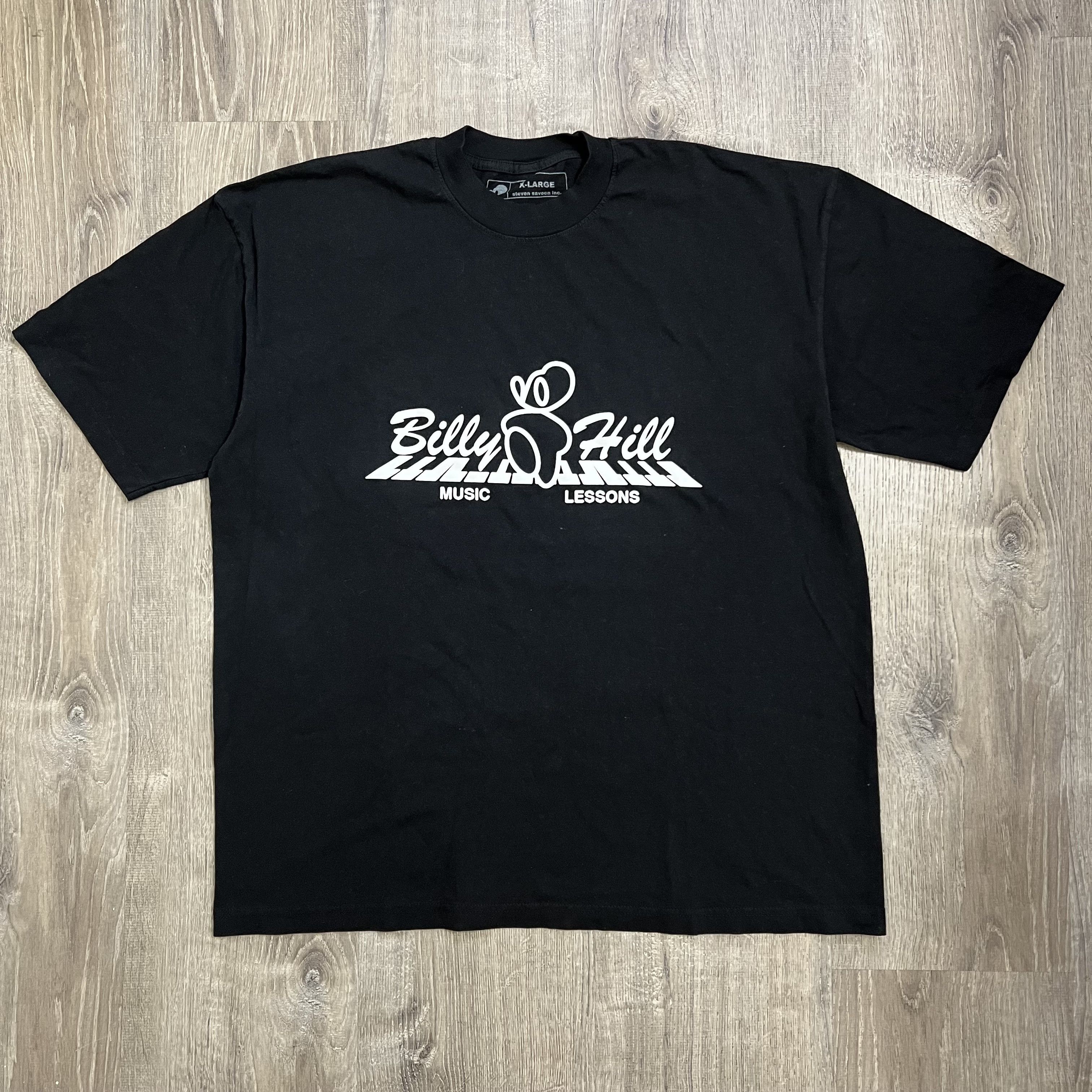 Father Steve Billy Hill x Father Steve Music Lessons Logo Tee XL | Grailed