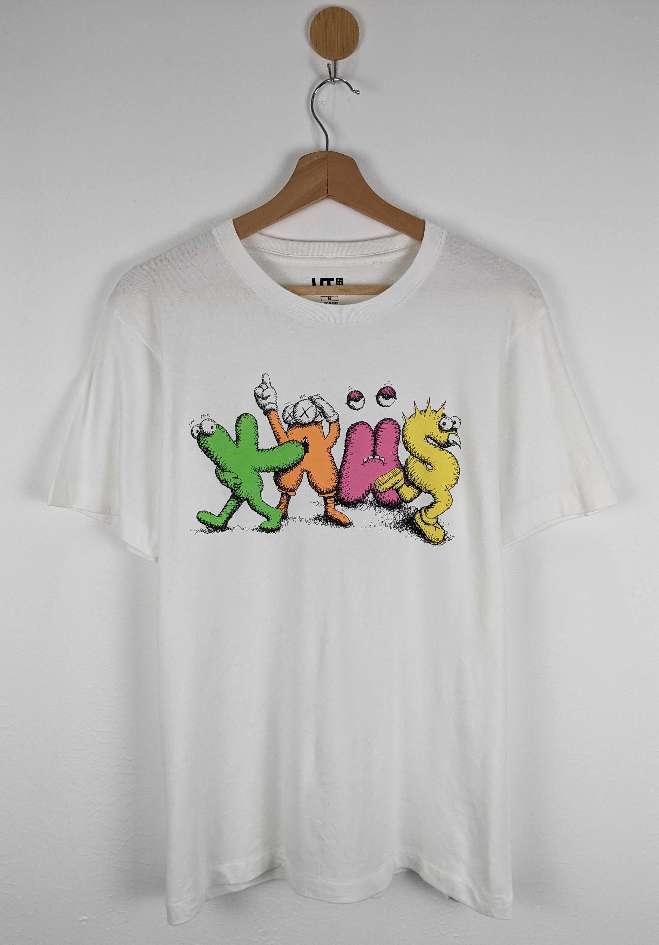 Kaws × Uniqlo Uniqlo Kaws Font logo shirt | Grailed