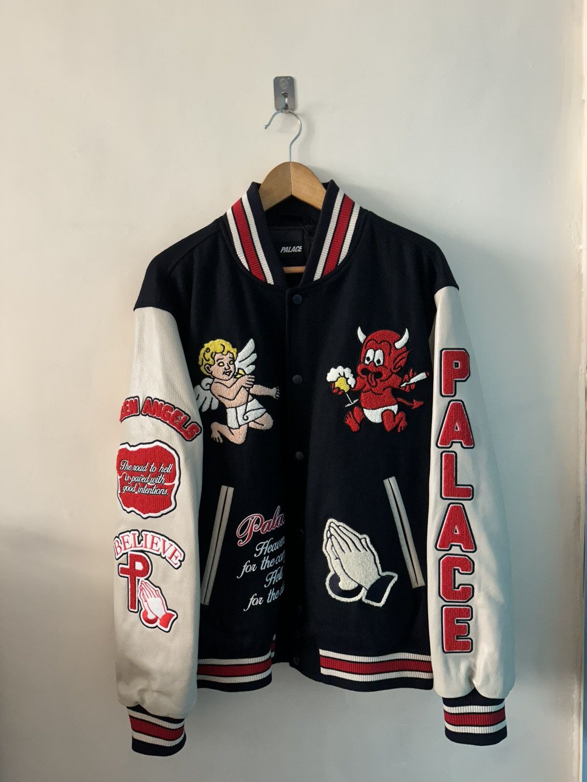 Palace Palace ‘Fallen Angel’ dark navy varsity jacket | Grailed