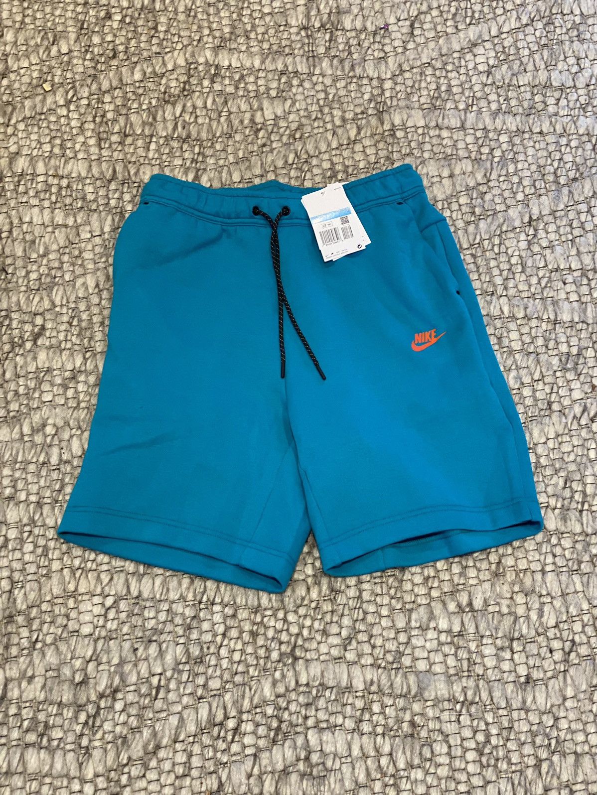 Nike Turquoise Nike Tech Fleece shorts | Grailed