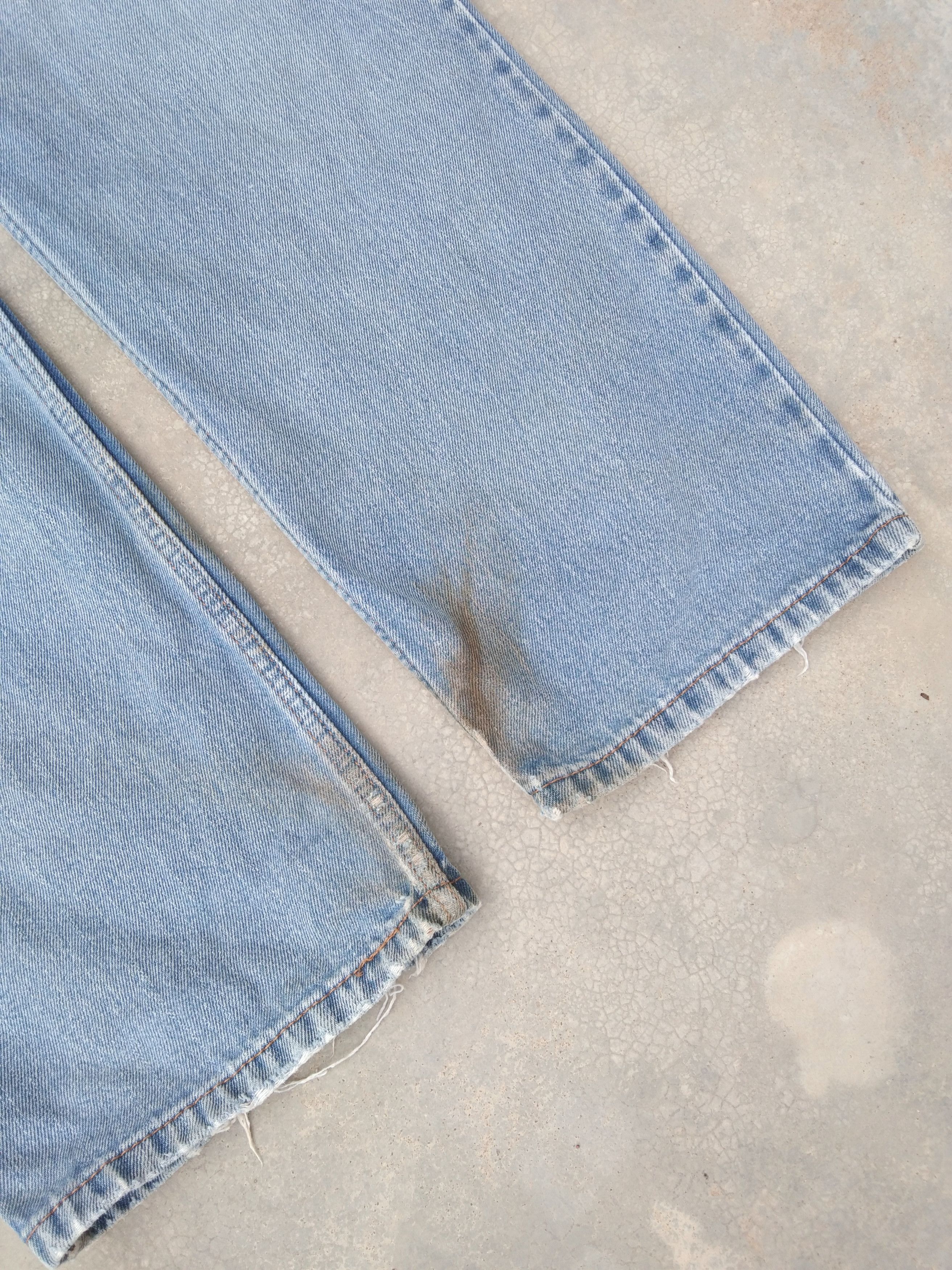 Levi's Vintage Levi's Jeans 550 Faded Blue Distressed Denim 38x32 | Grailed