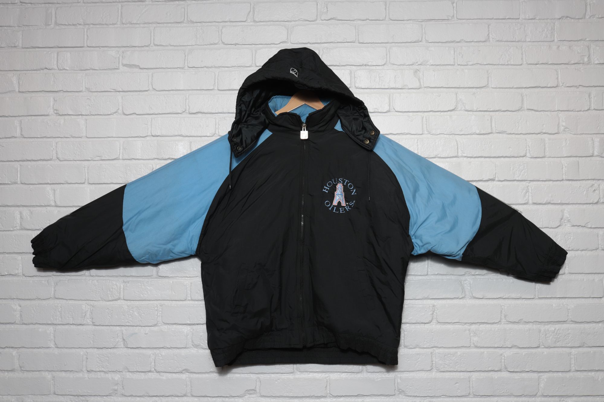 Vintage 90s houston oilers logo 7 puffer jacket size xl | Grailed