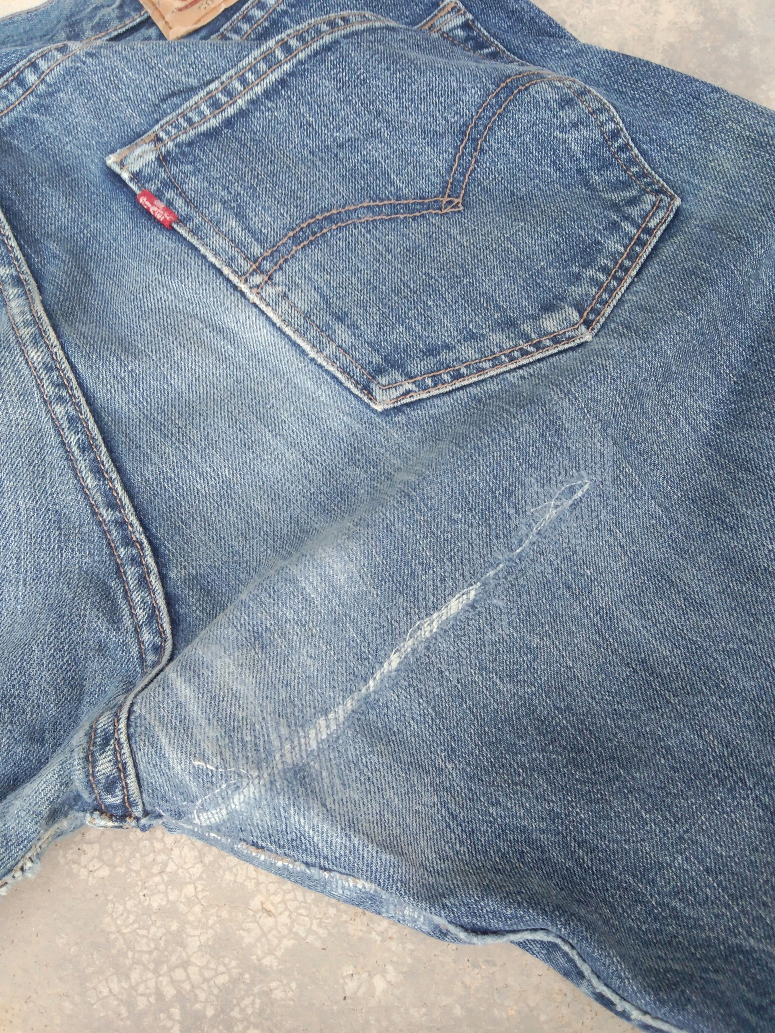 Levi's Vintage Levi's 501 Faded Blue Distressed Jeans 33x32 | Grailed