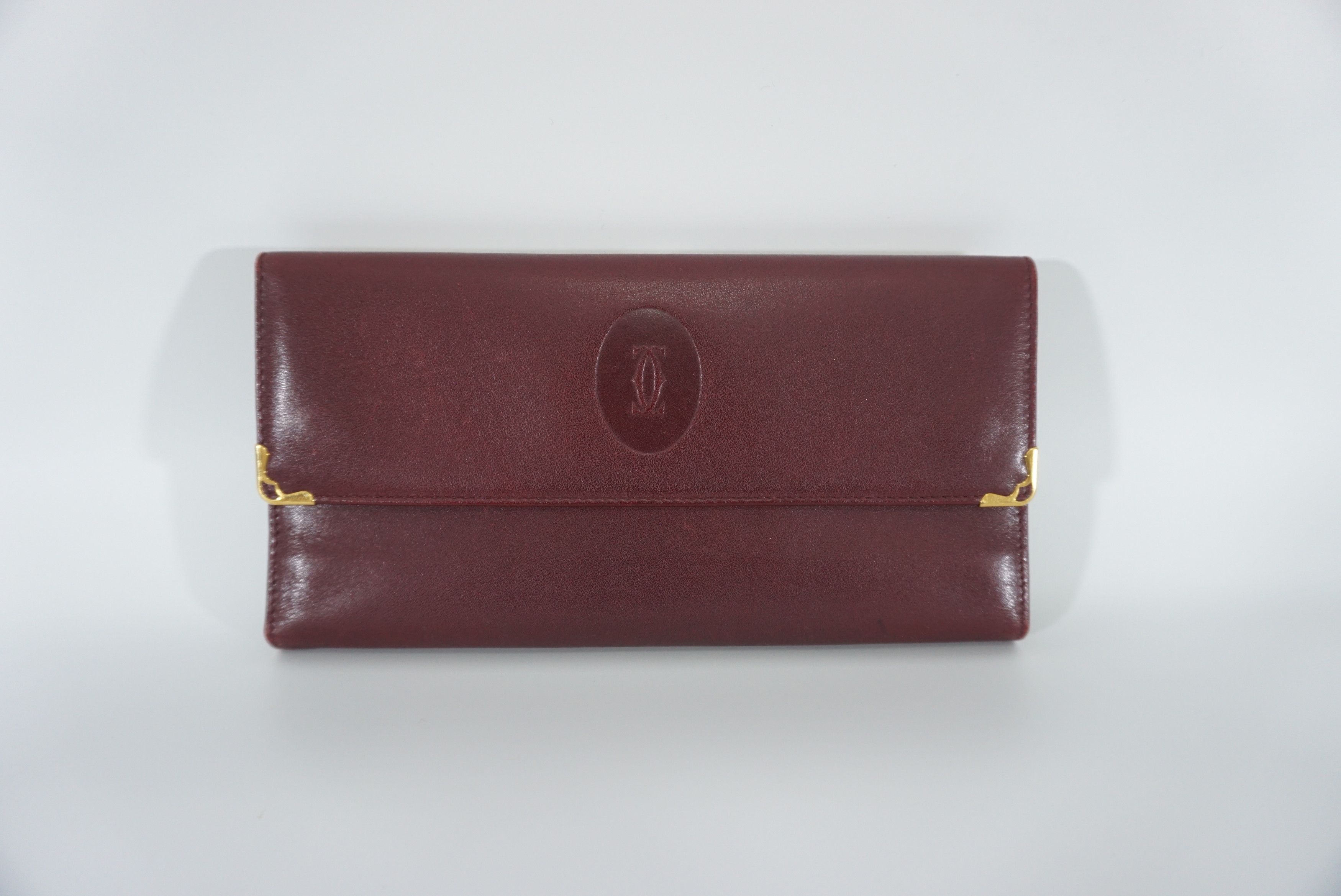 Cartier Cartier Embossed Leather Logo Bi-Fold Organizer Wallet | Grailed