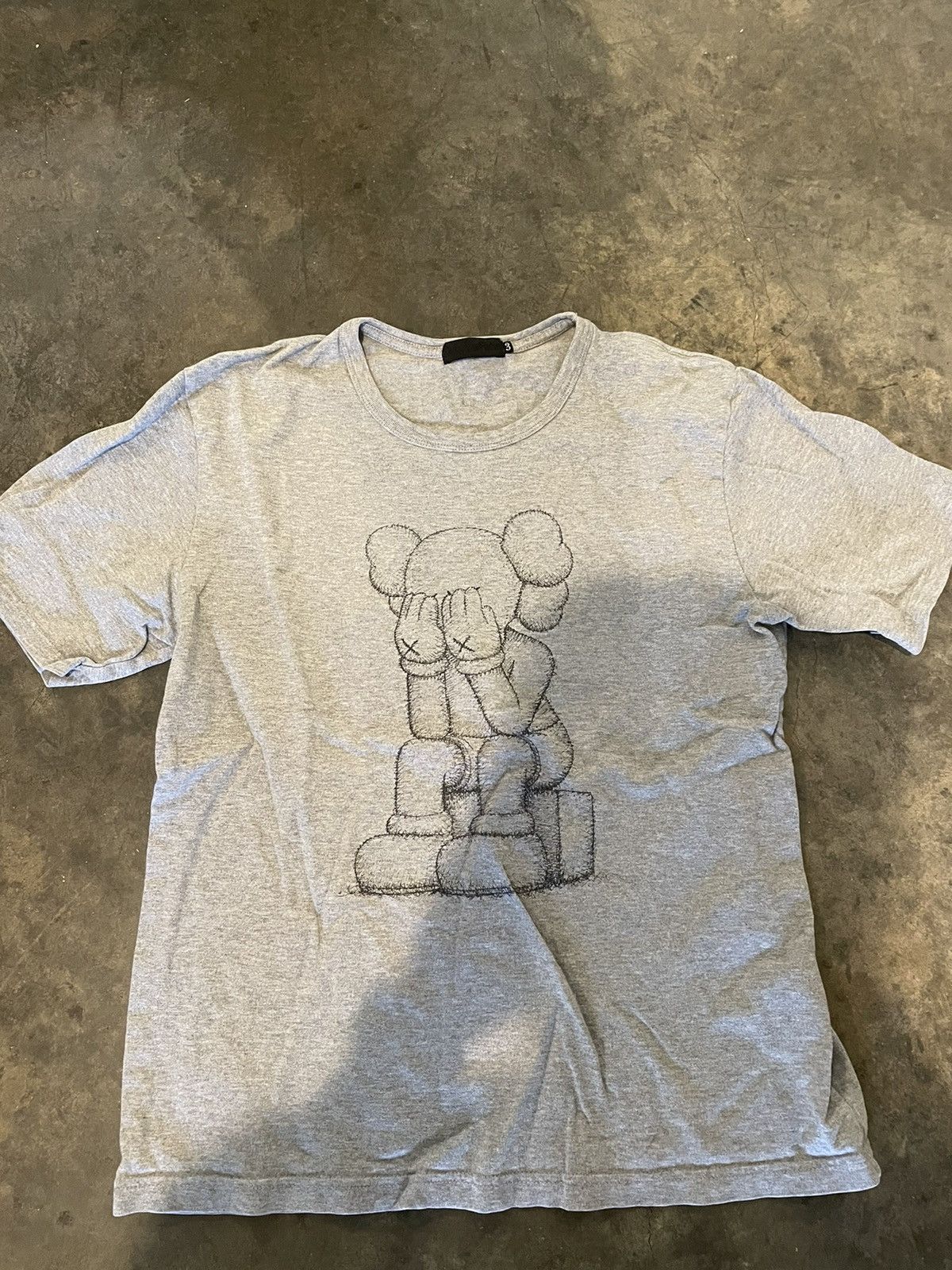 Kaws × Original Fake Kaws Passing Through Companion Tshirt | Grailed