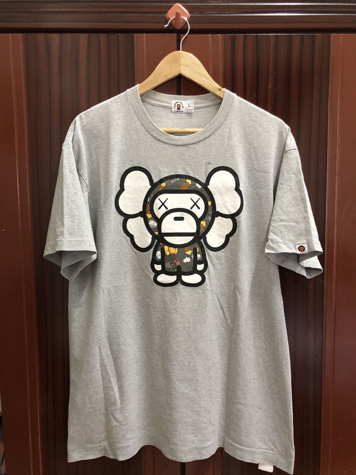 Bape × Kaws Bape x Kaws Baby Milo Tee | Grailed