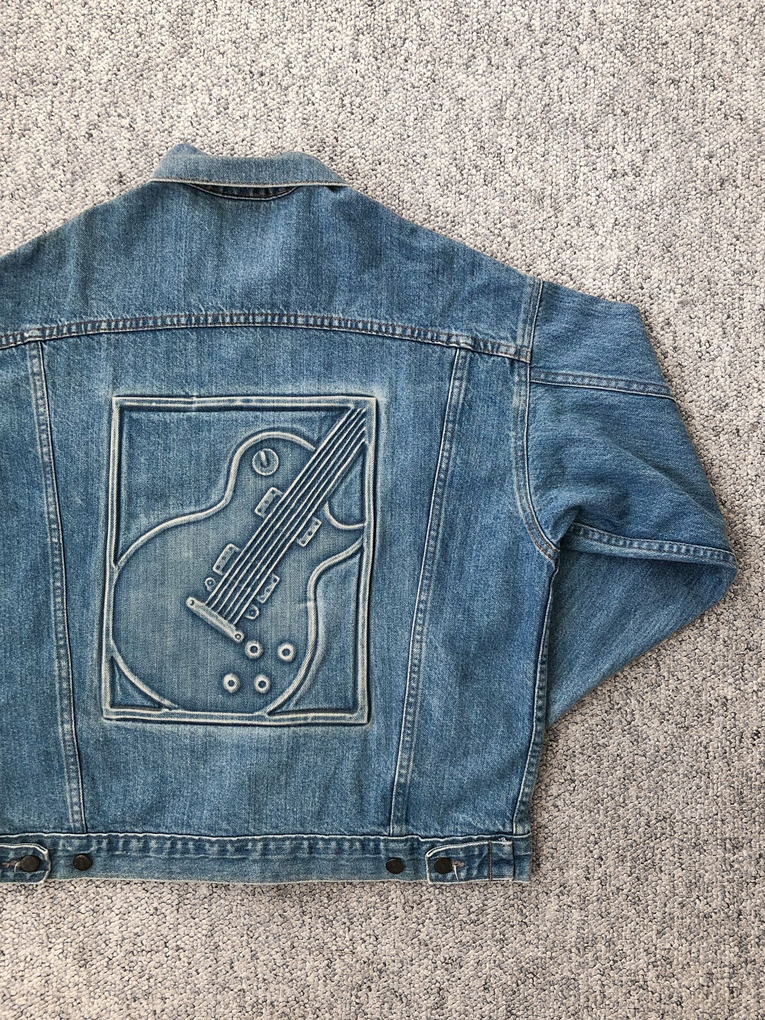 Vintage 90s Boxy Faded Embossed 'Guitar' Denim Jacket | Grailed