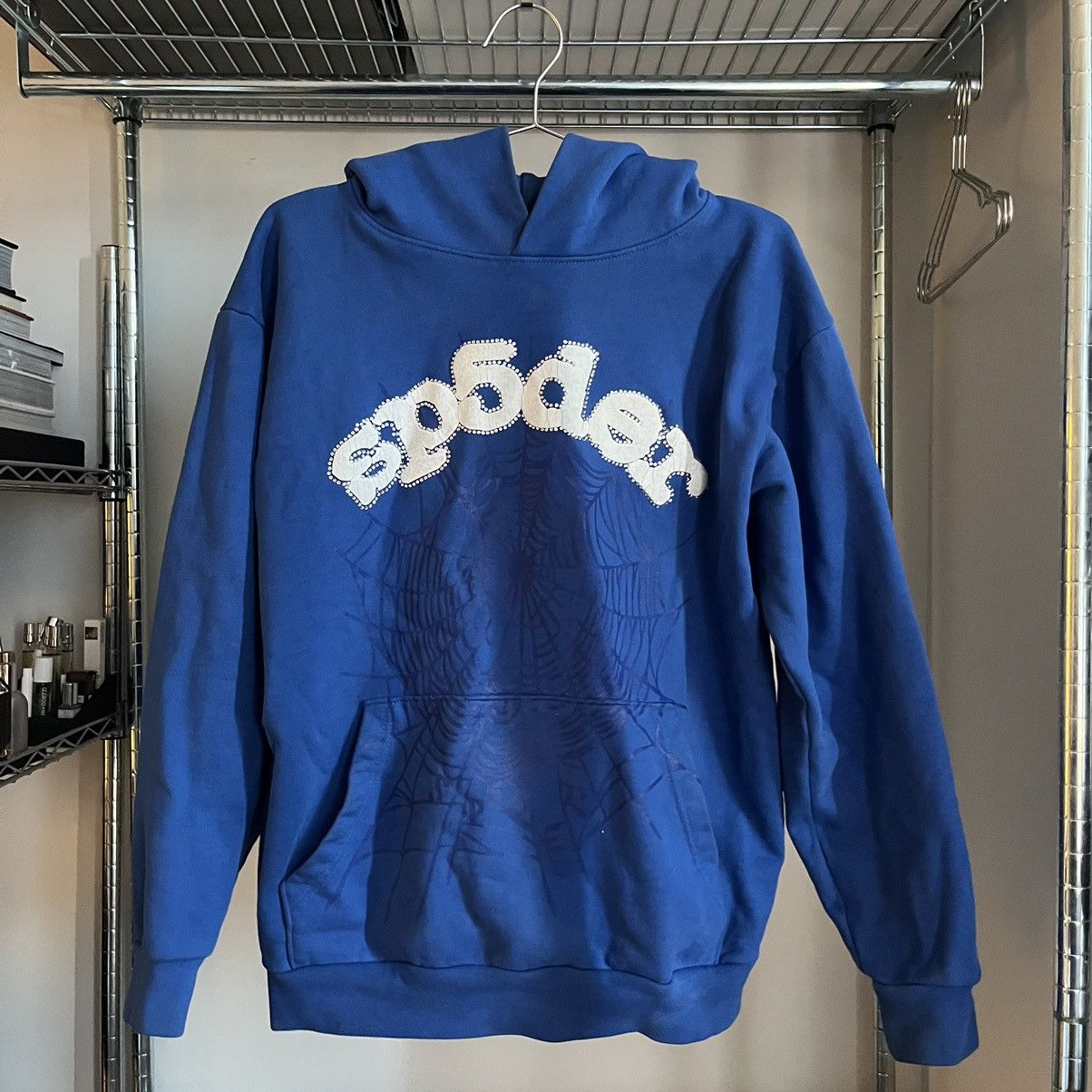 Spider Worldwide SP5DER SPIDER WORLDWIDE BLUE WEBSUIT HOODIE | Grailed
