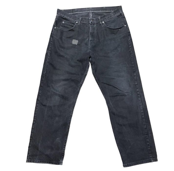 Vintage Wrangler patch jeans | Grailed
