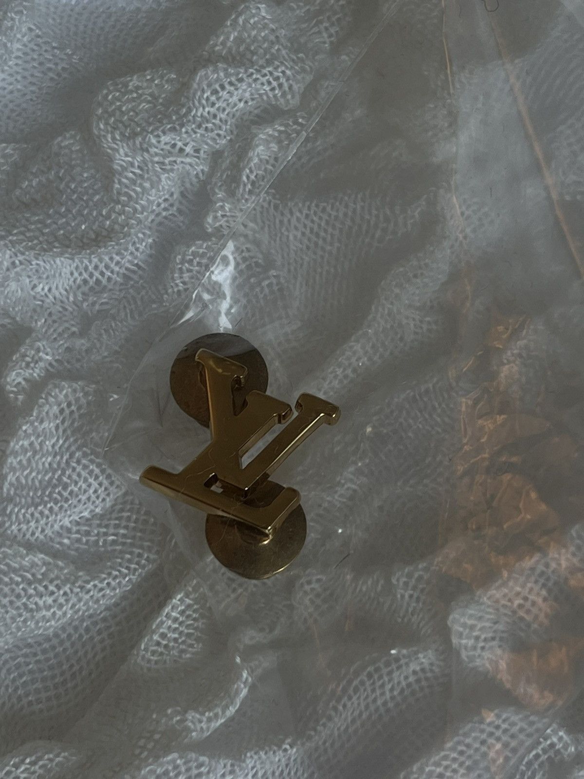 Louis Vuitton LV gold suit pin | Grailed