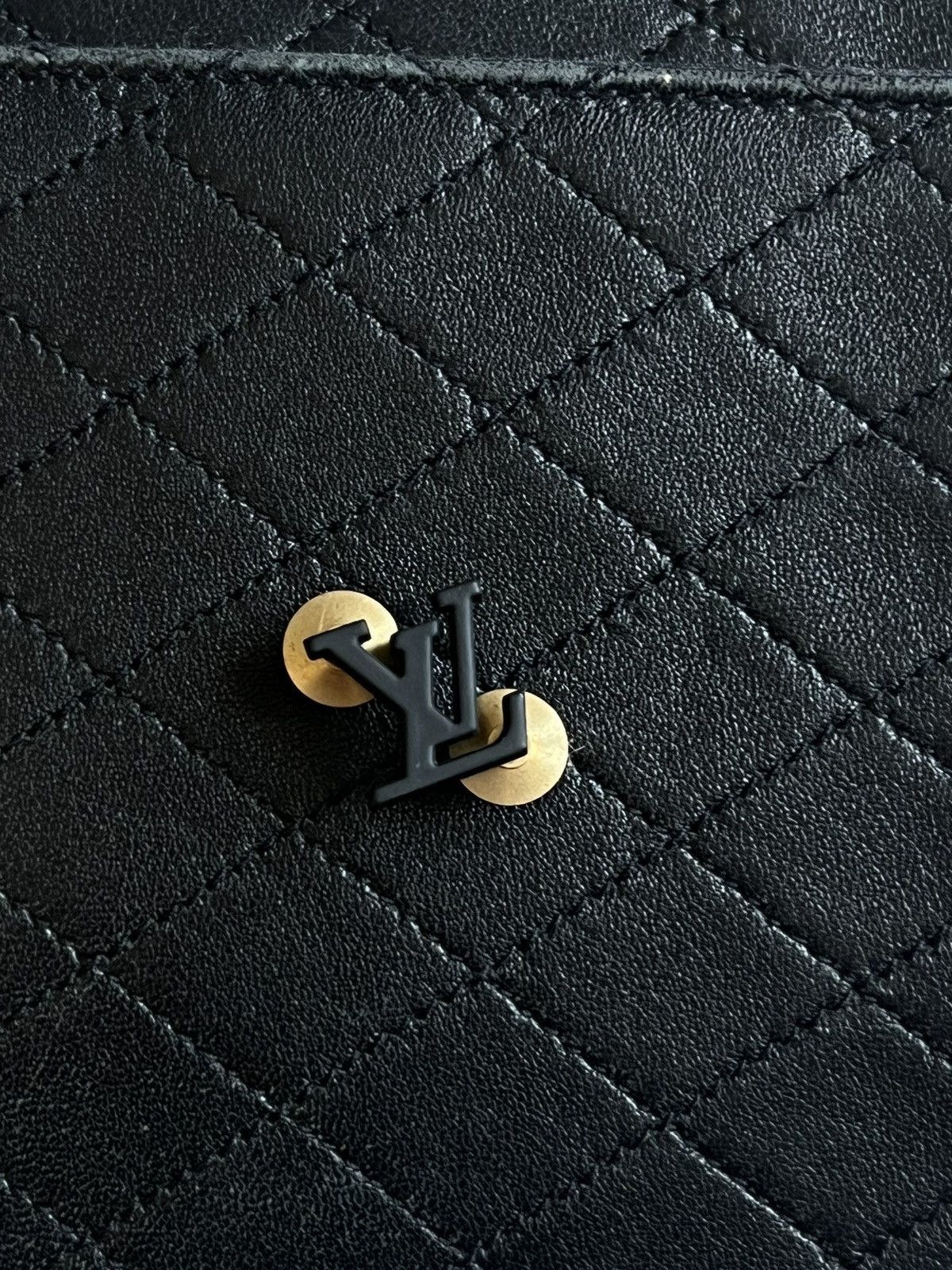 Louis Vuitton Louis Vuitton matte black suit pin | Grailed