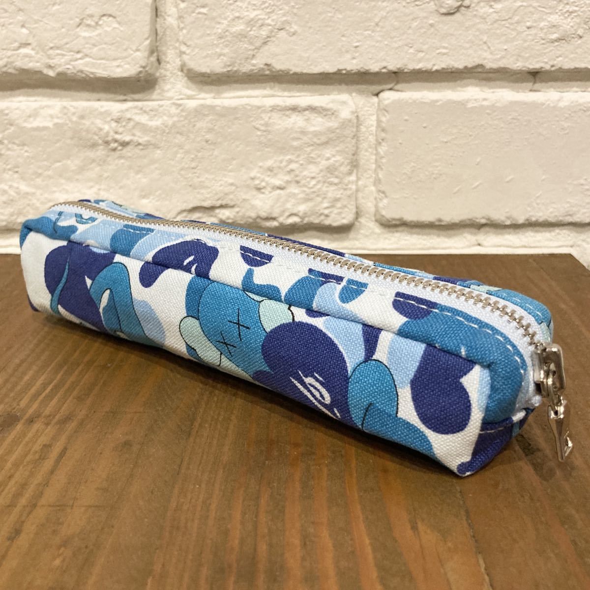Bape × Kaws BAPE × kaws bendy ABC camo blue pen case pouch a bathing ...