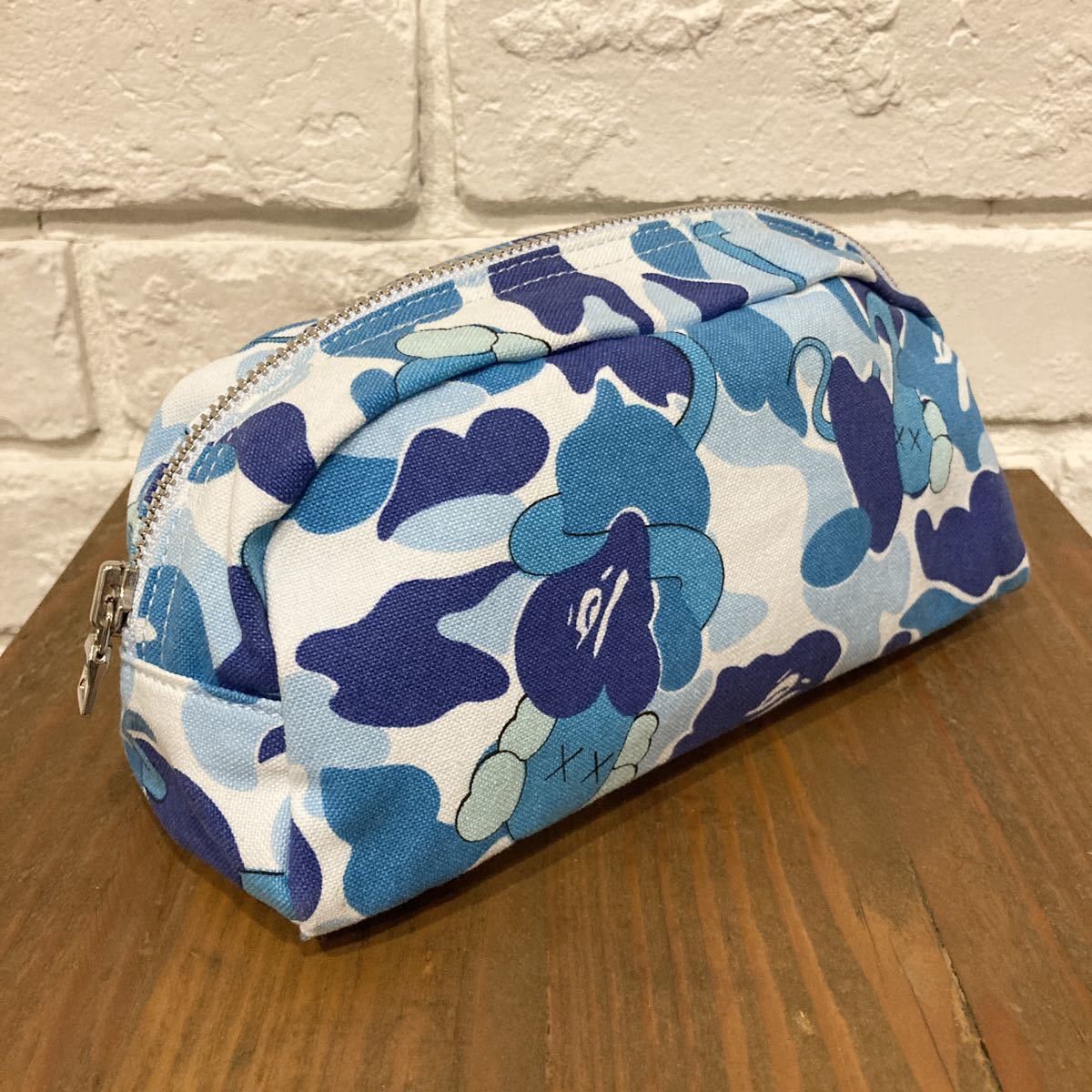 Bape BAPE × kaws bendy ABC camo blue pouch a bathing ape NIGO | Grailed