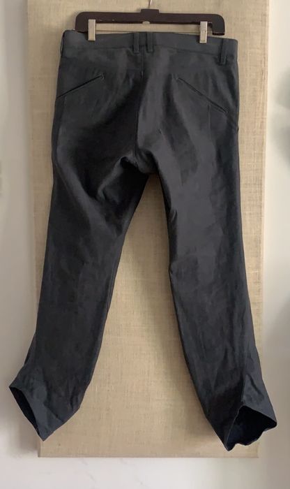 Julius DEVOA japan, twisted curve, “cutout” back hem pants | Grailed