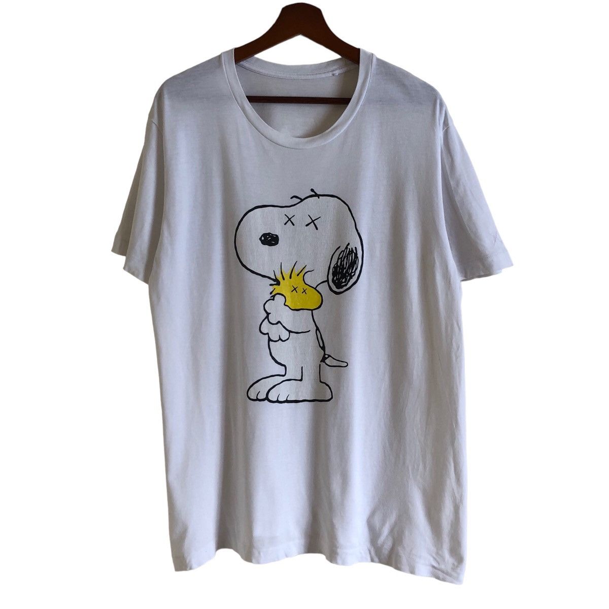 Kaws × Peanuts × Uniqlo Single Stich Kaws X Peanuts X Uniqlo tee | Grailed