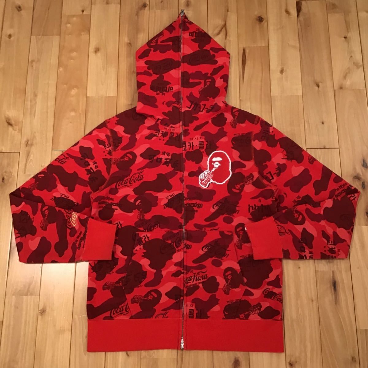 Bape × Coca Cola BAPE × Coca Cola ape head Red camo Full zip hoodie ...