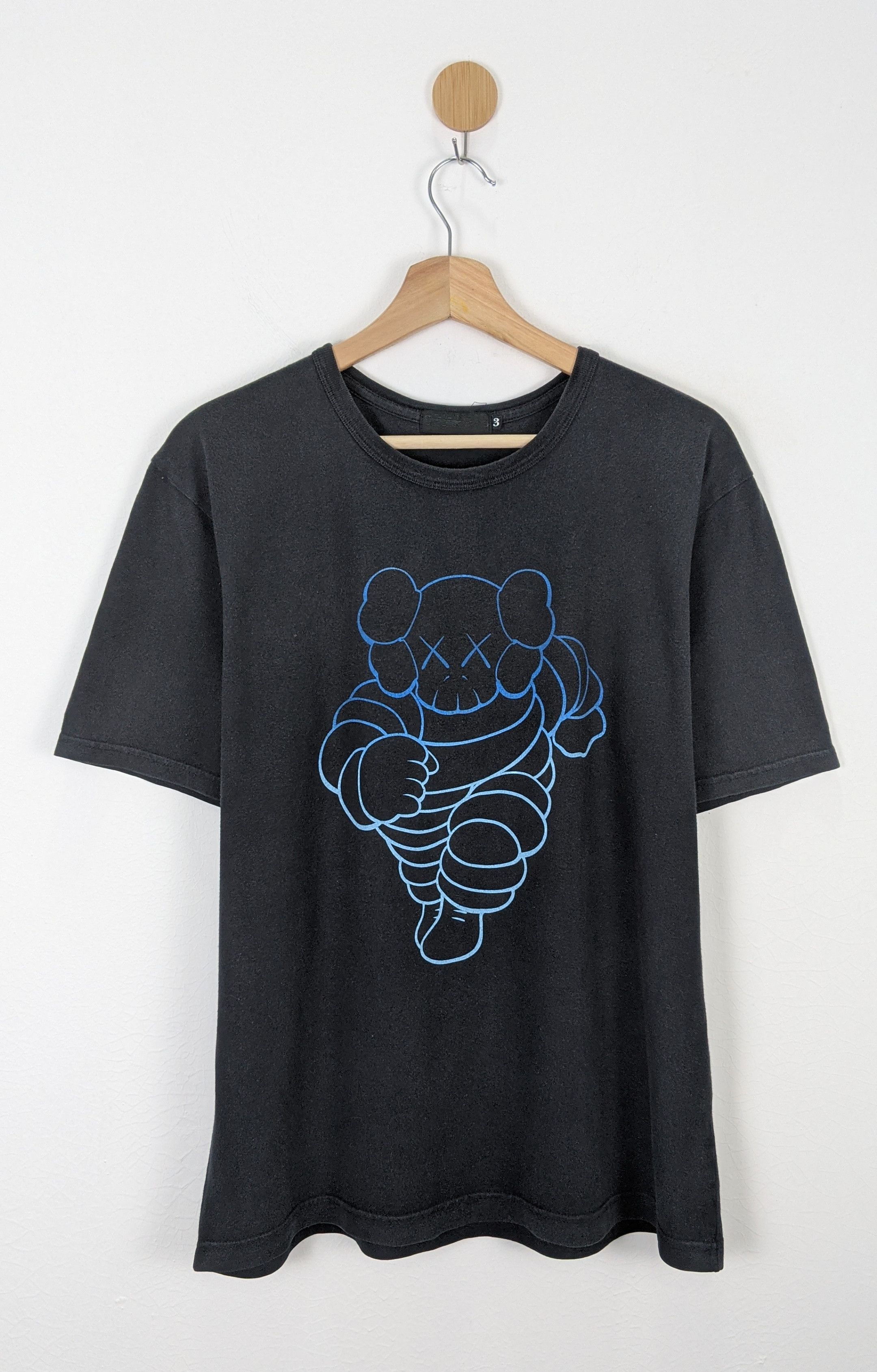 Kaws × Original Fake Original Fake Kaws Running Chum shirt | Grailed