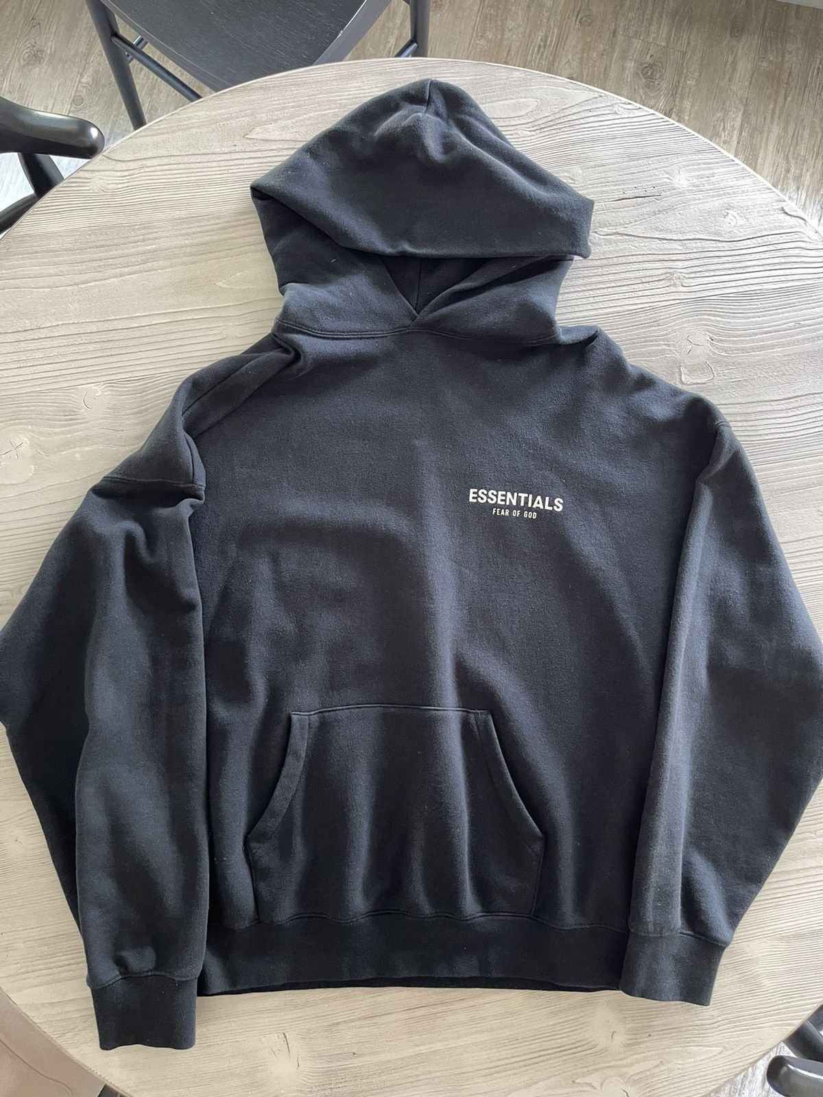 Pacsun Fear of god essentials hoodie black | Grailed