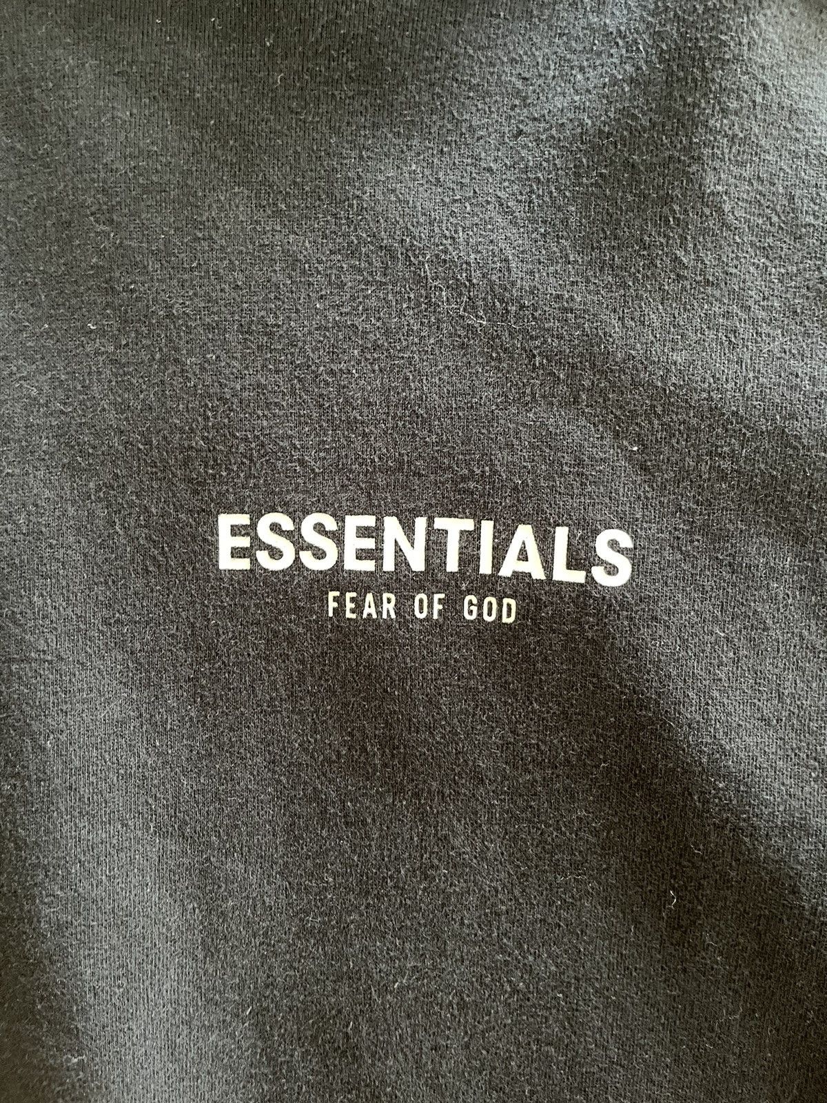 Pacsun Fear of god essentials hoodie black | Grailed