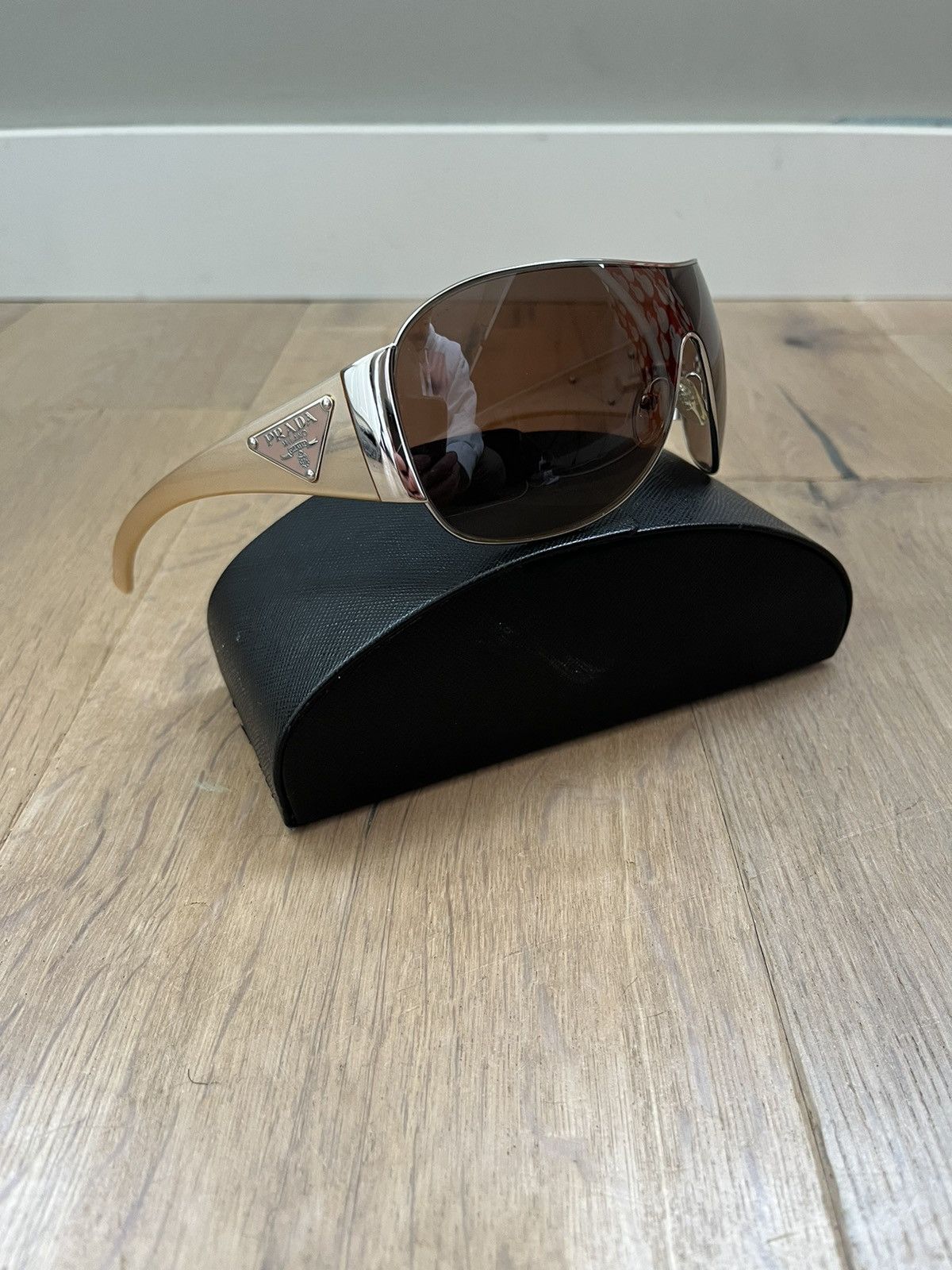 Prada Prada Triangle Logo Mask SPR 57L 1BC-8C1 120 3N Sunglasses | Grailed