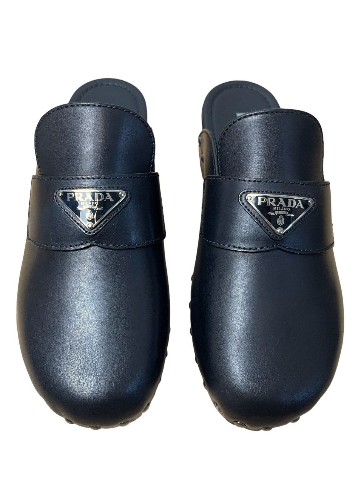 Prada Prada clogs in black leather | Grailed