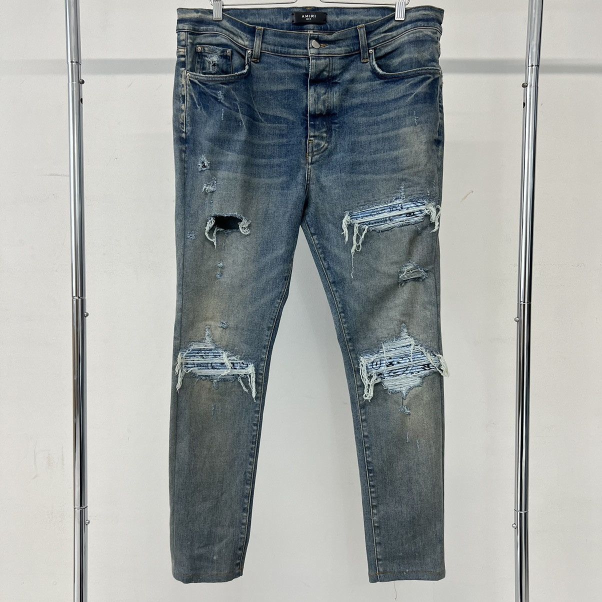 Amiri Amiri Distressed Patch Jeans | Grailed