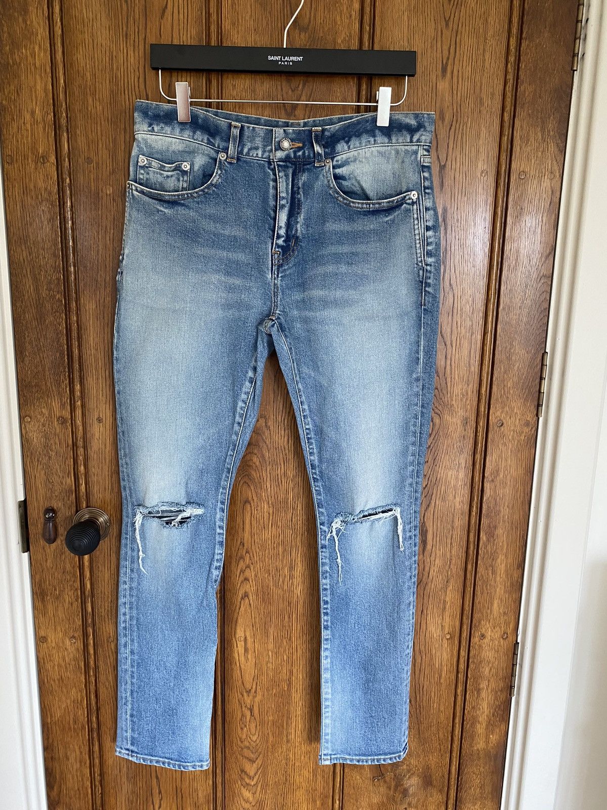 Saint Laurent Paris Saint Laurent D10 knee slit distressed denim jeans ...