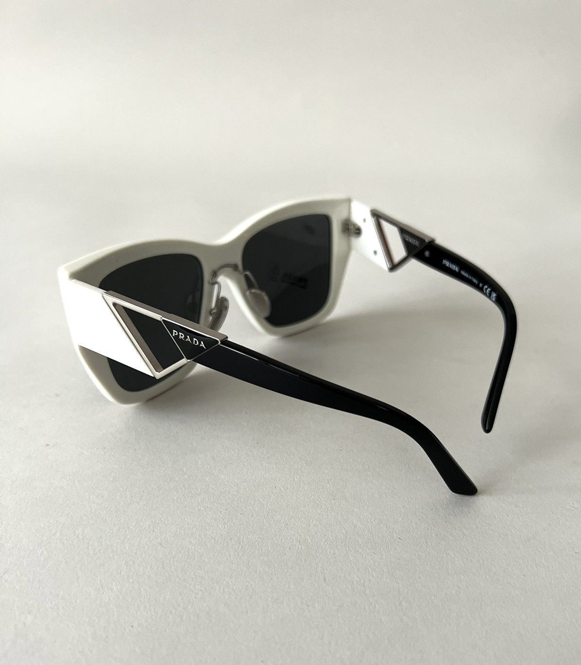 Prada Prada Frame Logo Sunglasses | Grailed
