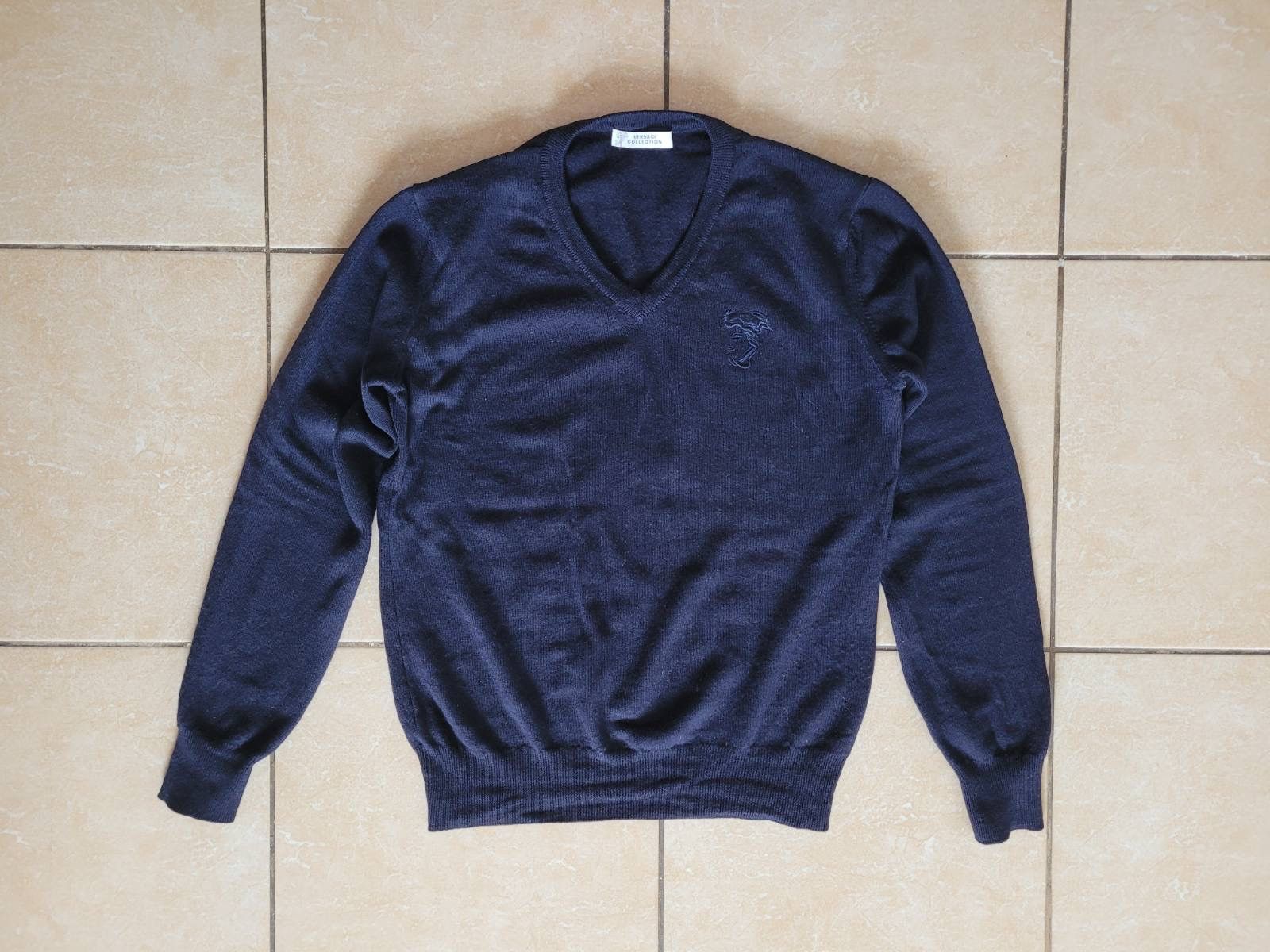 Italian Designers × Luxury × Versace Versace Half Medusa v-neck sweater ...