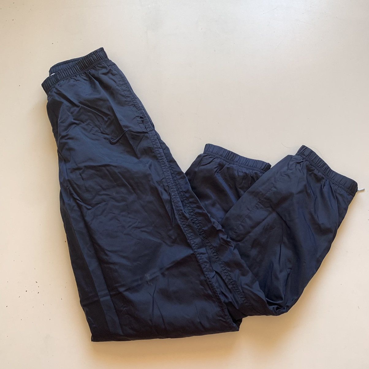 Nike × Vintage Vintage 90s Nike embroidered swoosh track pants navy ...
