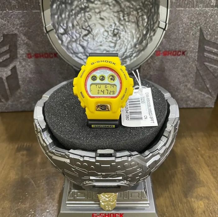 G Shock Casio G Shock DW-6900BUMB22-9P Transformers x G Shock | Grailed
