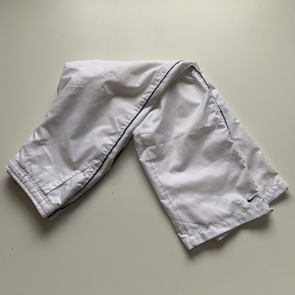 Nike × Vintage Vintage 90s nike embroidered swoosh track pants white ...
